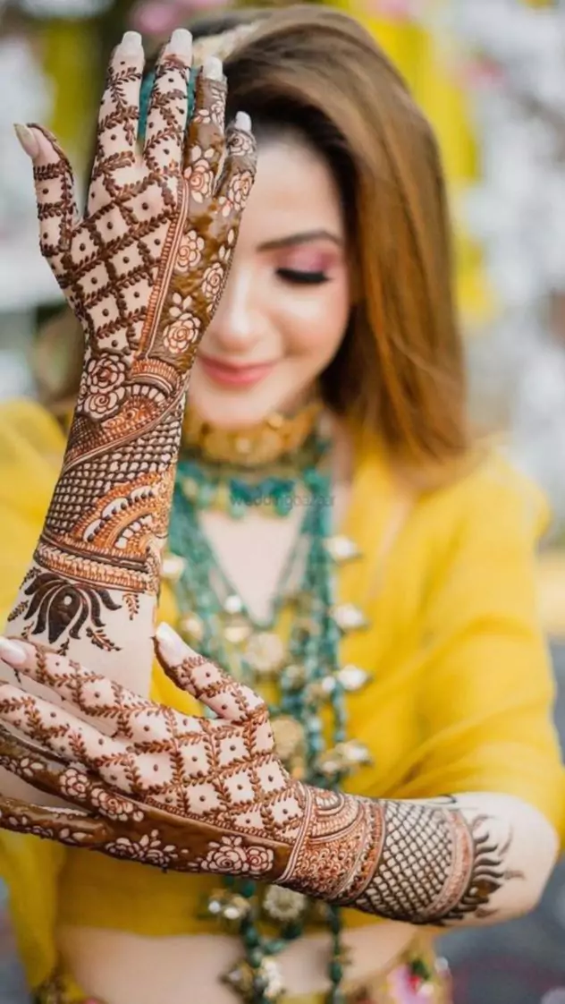 floral-mesh-bridal-back-hand-mehndi-designs - Infifashion